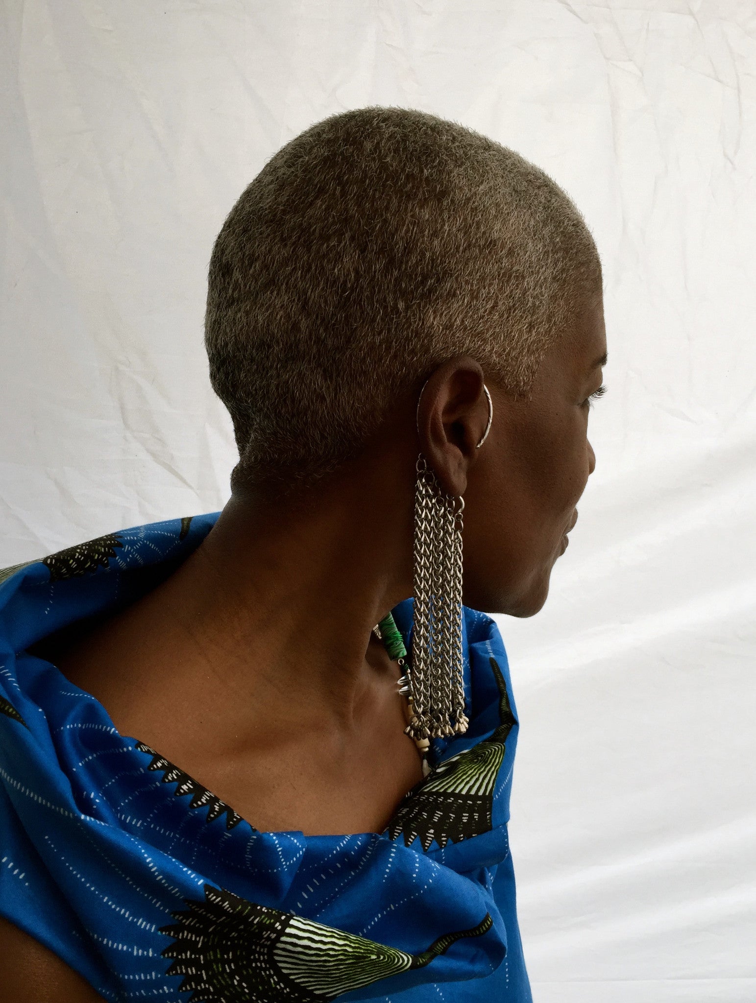 NY Clothes designer Simply Greta wearing the ear curtain earring – Nyet ...